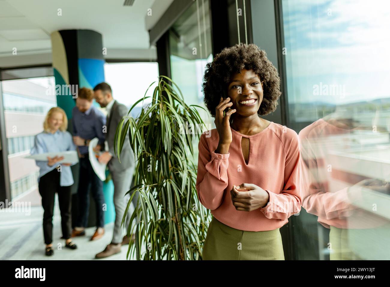 African american woman smiles hi-res stock photography and images - Alamy
