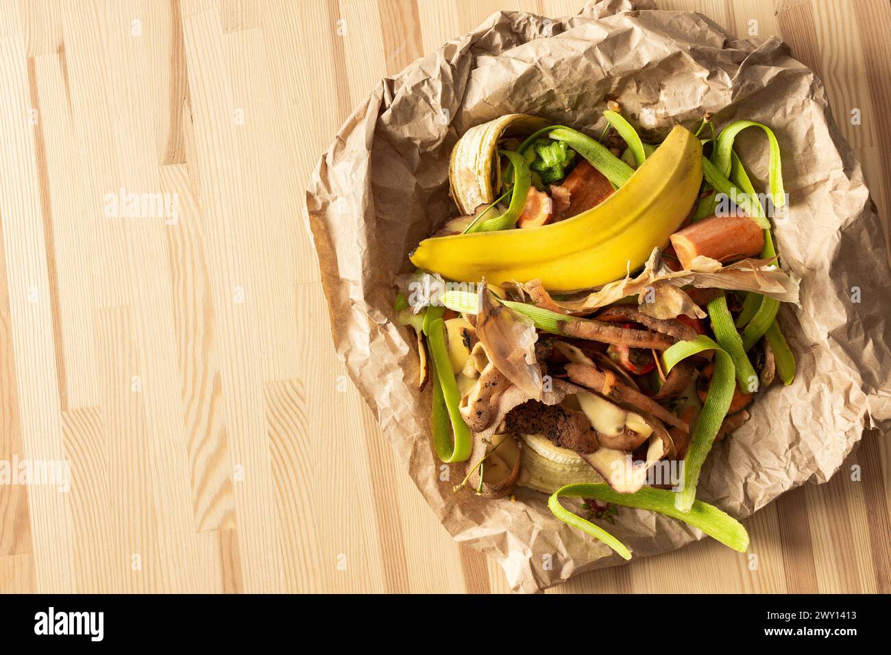 Food organic waste on eco friendly parchment paper, fruit and vegetable ...