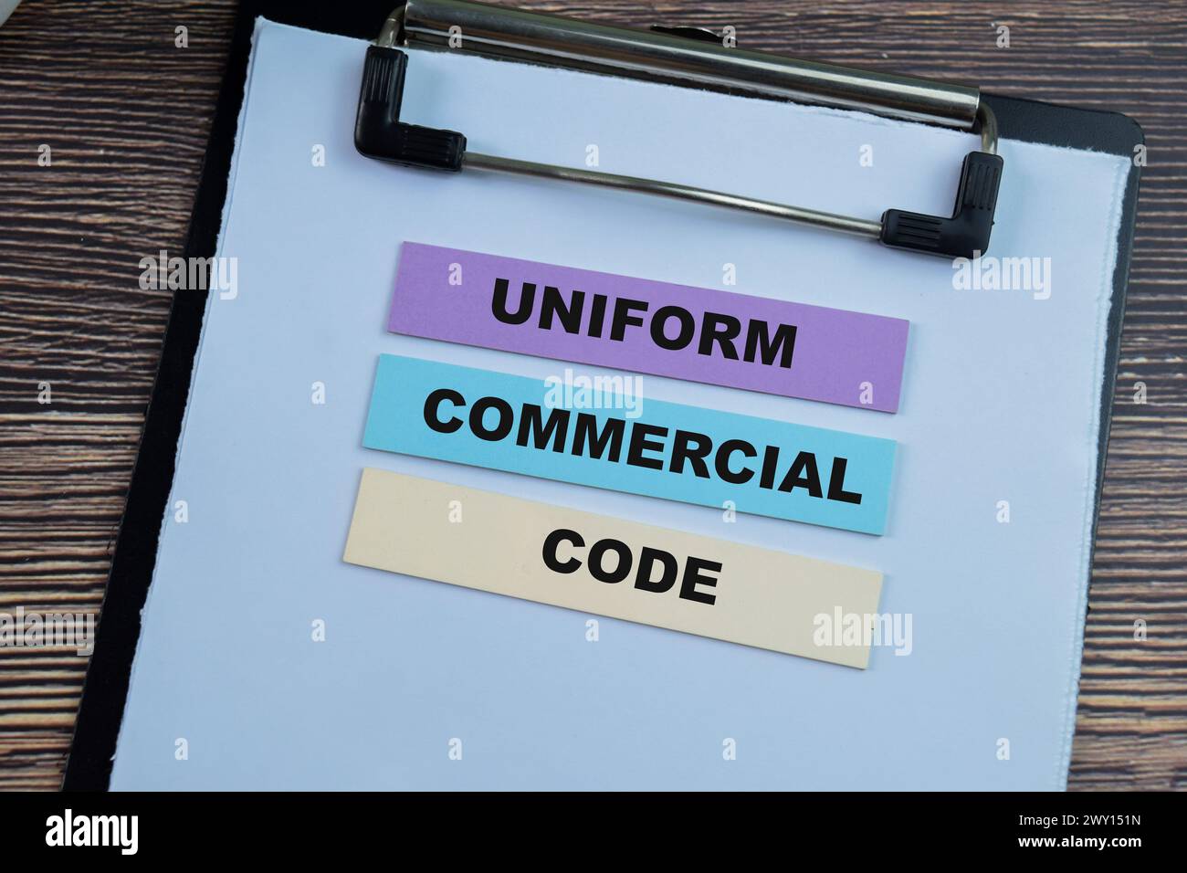 Concept of Uniform Commercial Code write on sticky notes isolated on ...