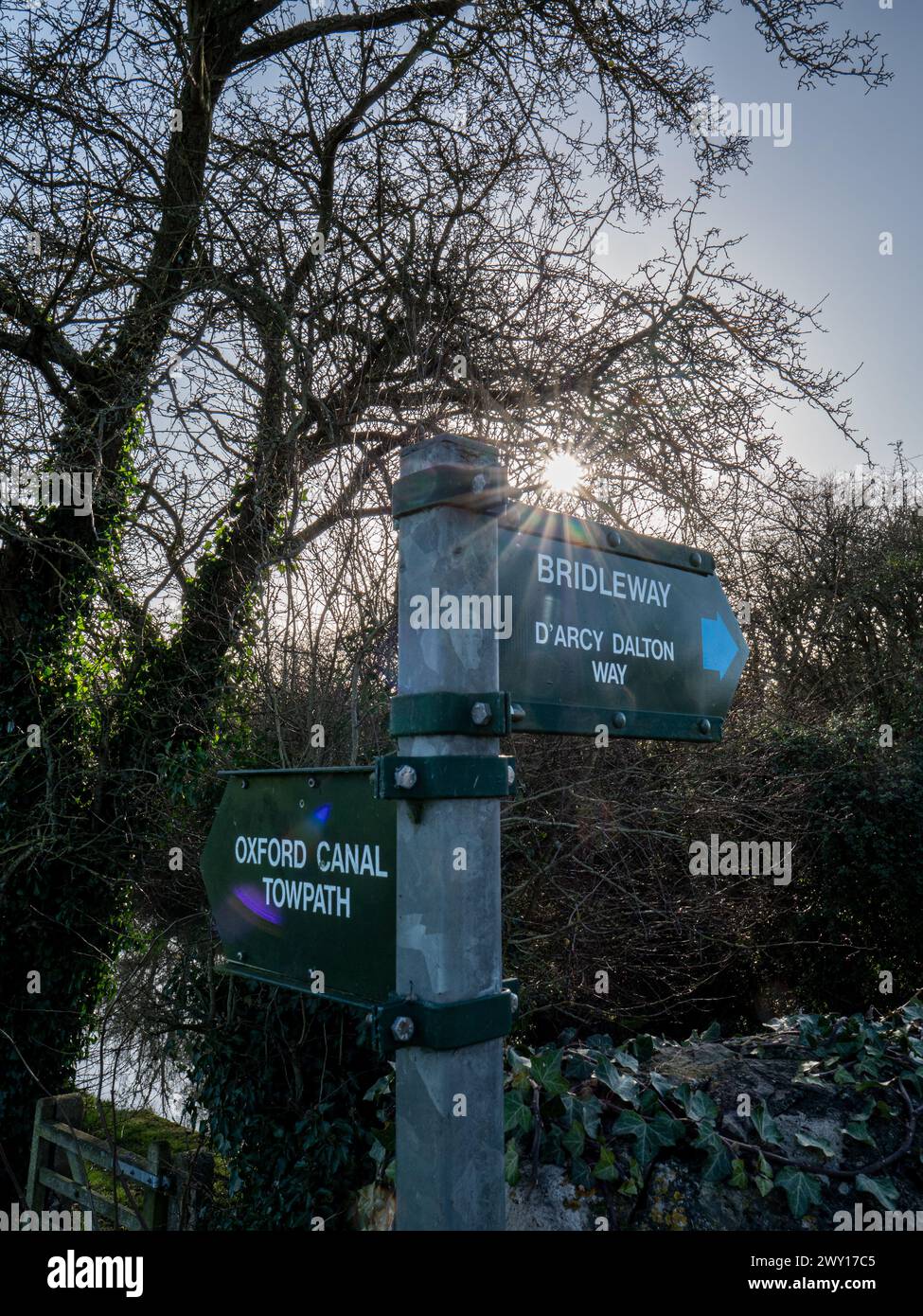Signpost on the Oxford Canal tow path signing to d'Arcy Dalton Way and ...
