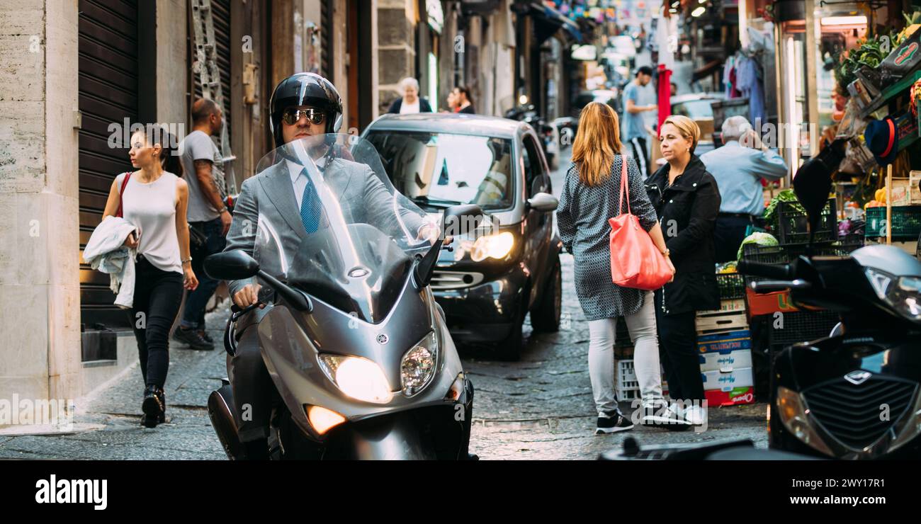 Naples, Italy. Man Riding On Scooter At Vico Lungo Del Gelso Street ...
