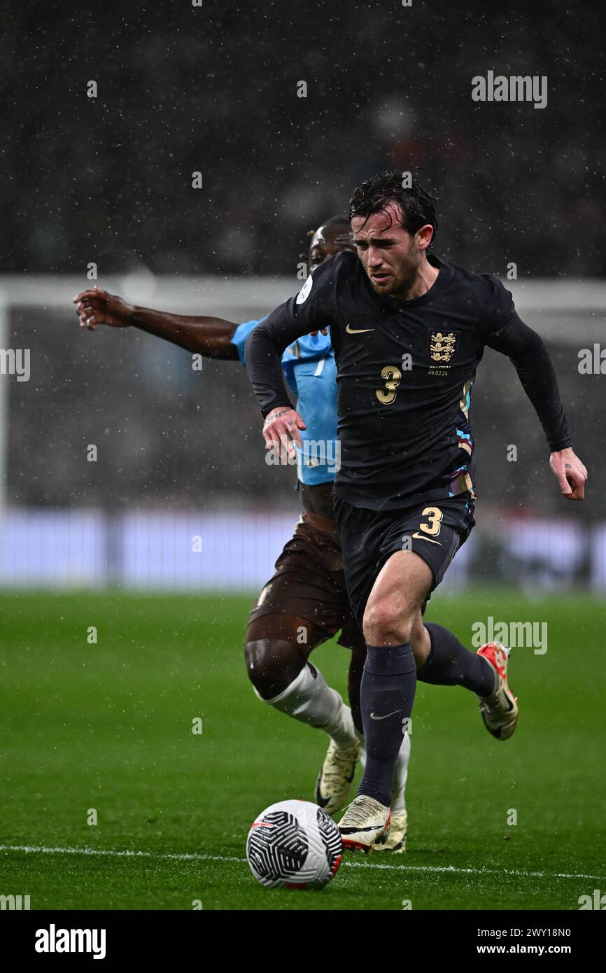 LONDON, ENGLAND - MARCH 26: Jeremy Doku, Ben Chilwell in action during ...