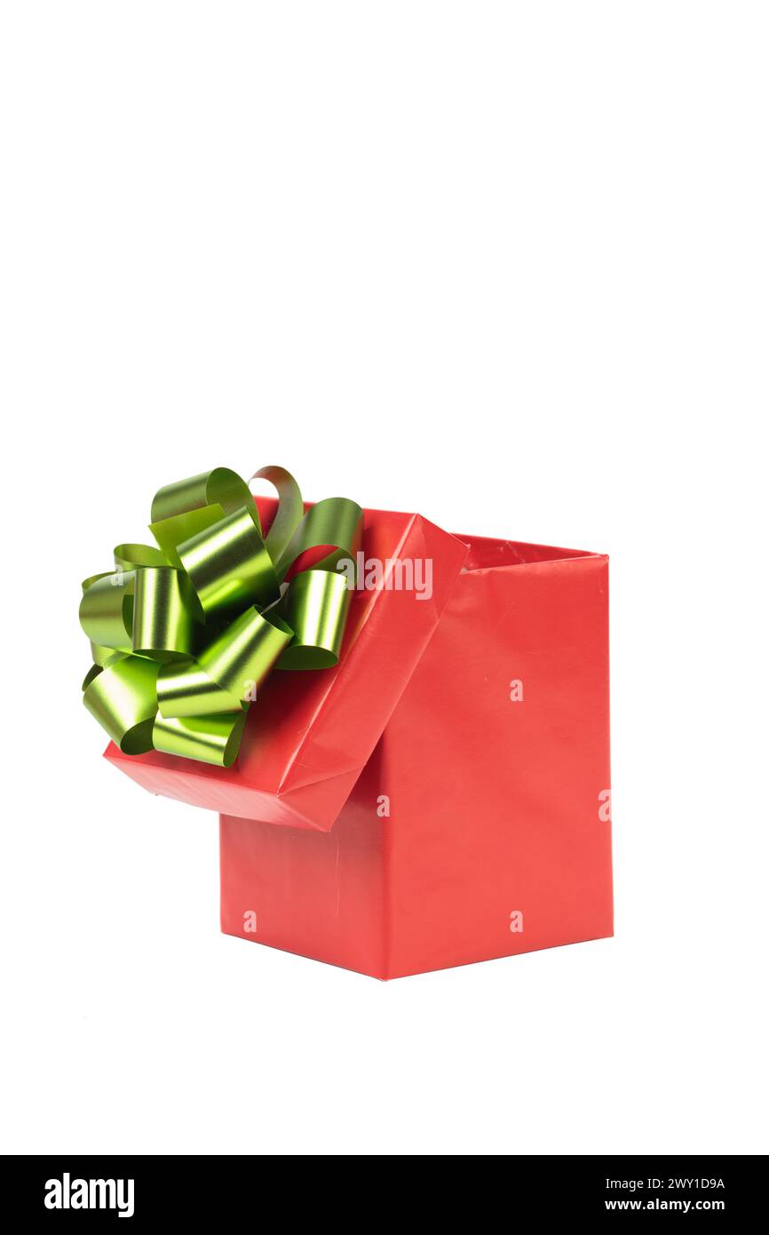 Red gift box with gold ribbon bow. Isolated over white background ...