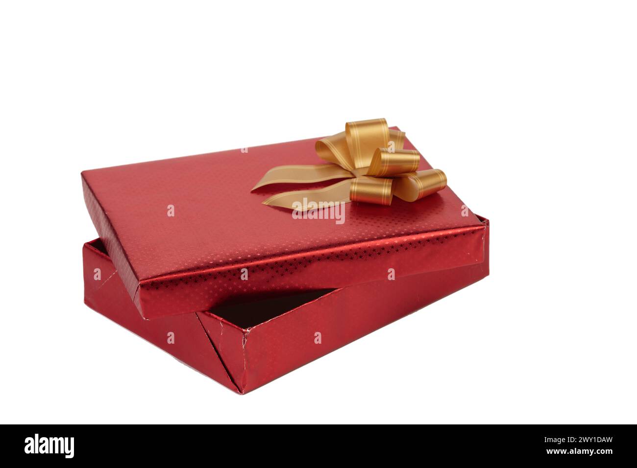 Red gift box with gold ribbon bow. Isolated over white background ...
