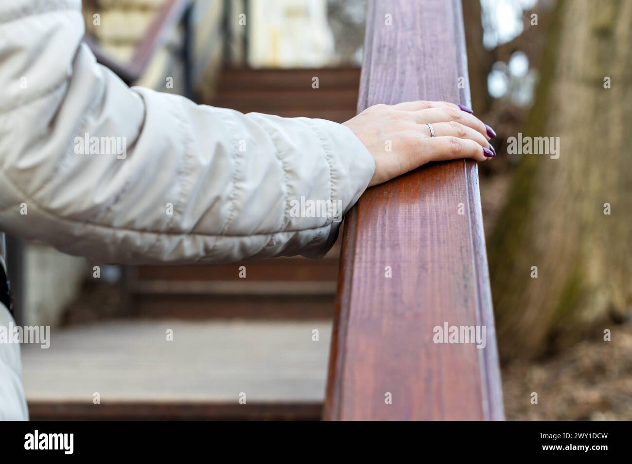 Hand holding railing hi-res stock photography and images - Alamy