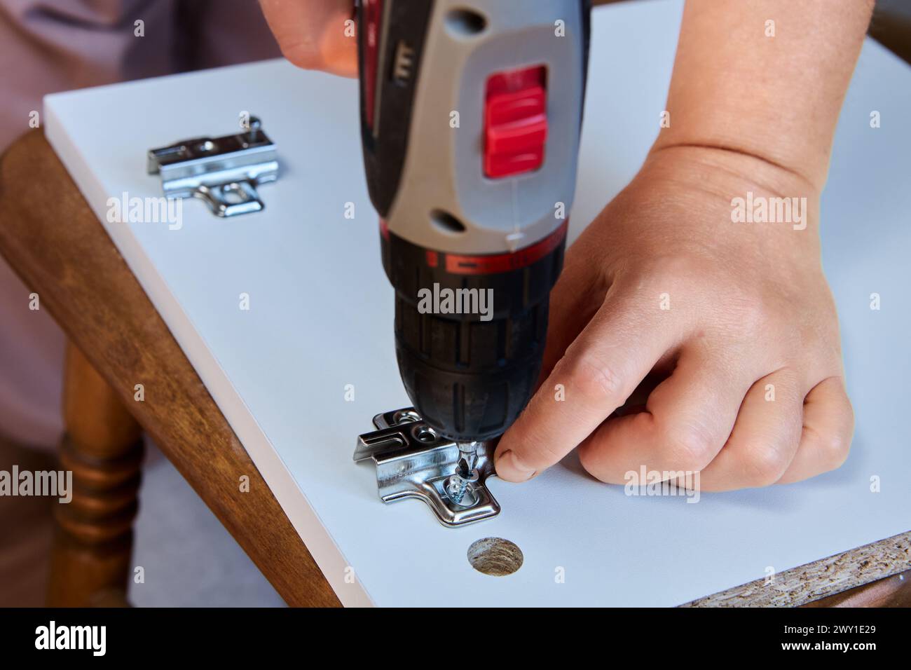 Flat pack furniture to DIY assemble, installing invisible adjustable ...