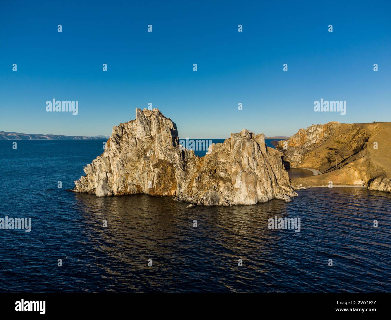 Shamanka Rock. Lake Baikal at Olkhon Island. the village of Khuzhir ...