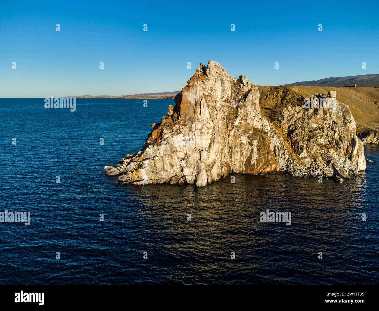 Shamanka Rock. Lake Baikal at Olkhon Island. the village of Khuzhir ...