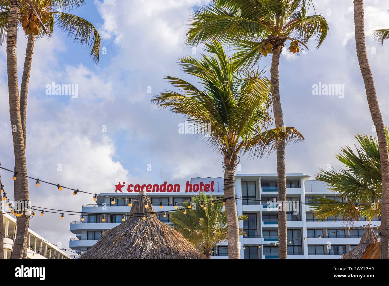 Beautiful view of the Corendon hotel building with palm trees against a ...