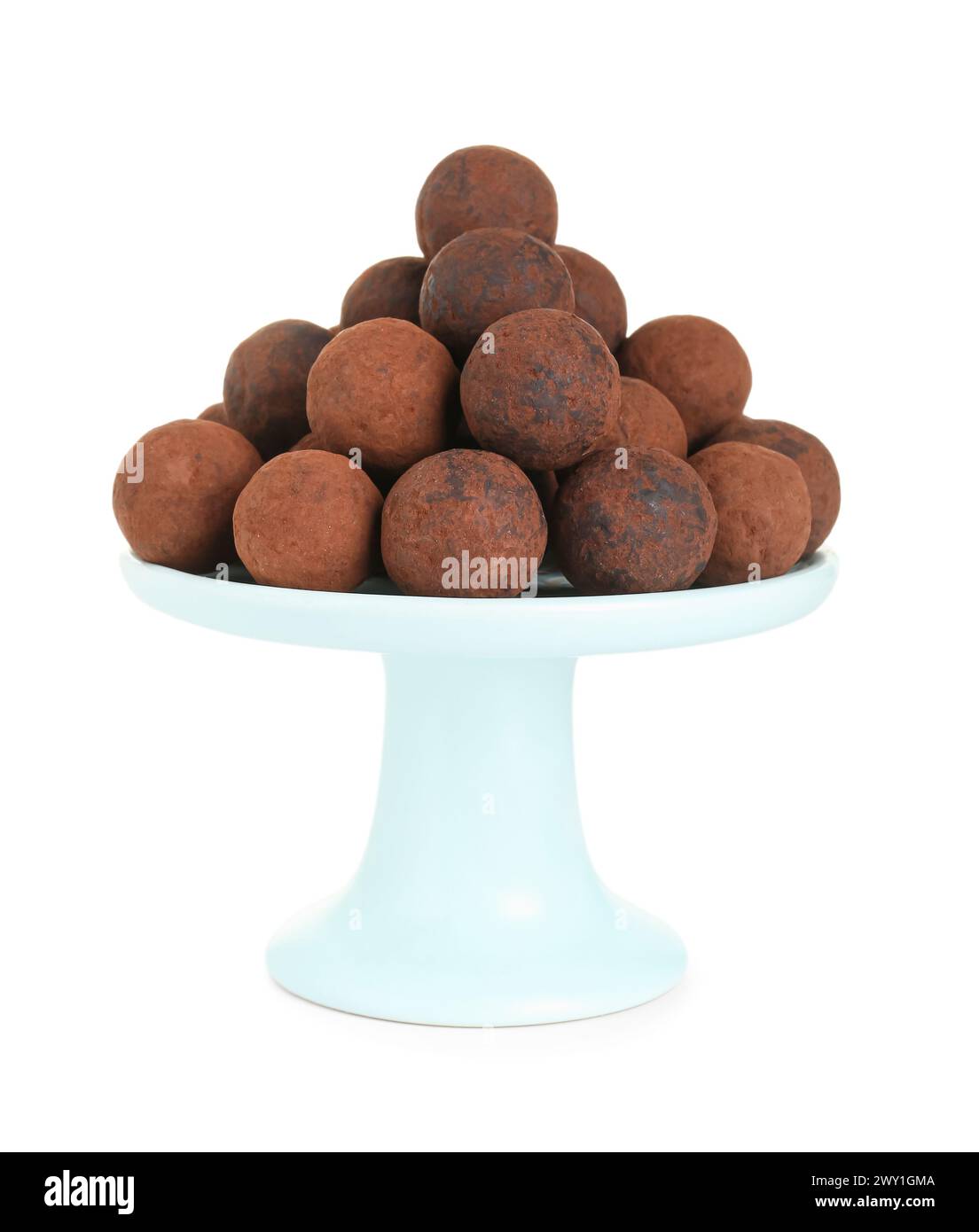 Dessert stand with tasty chocolate truffles on white background Stock ...
