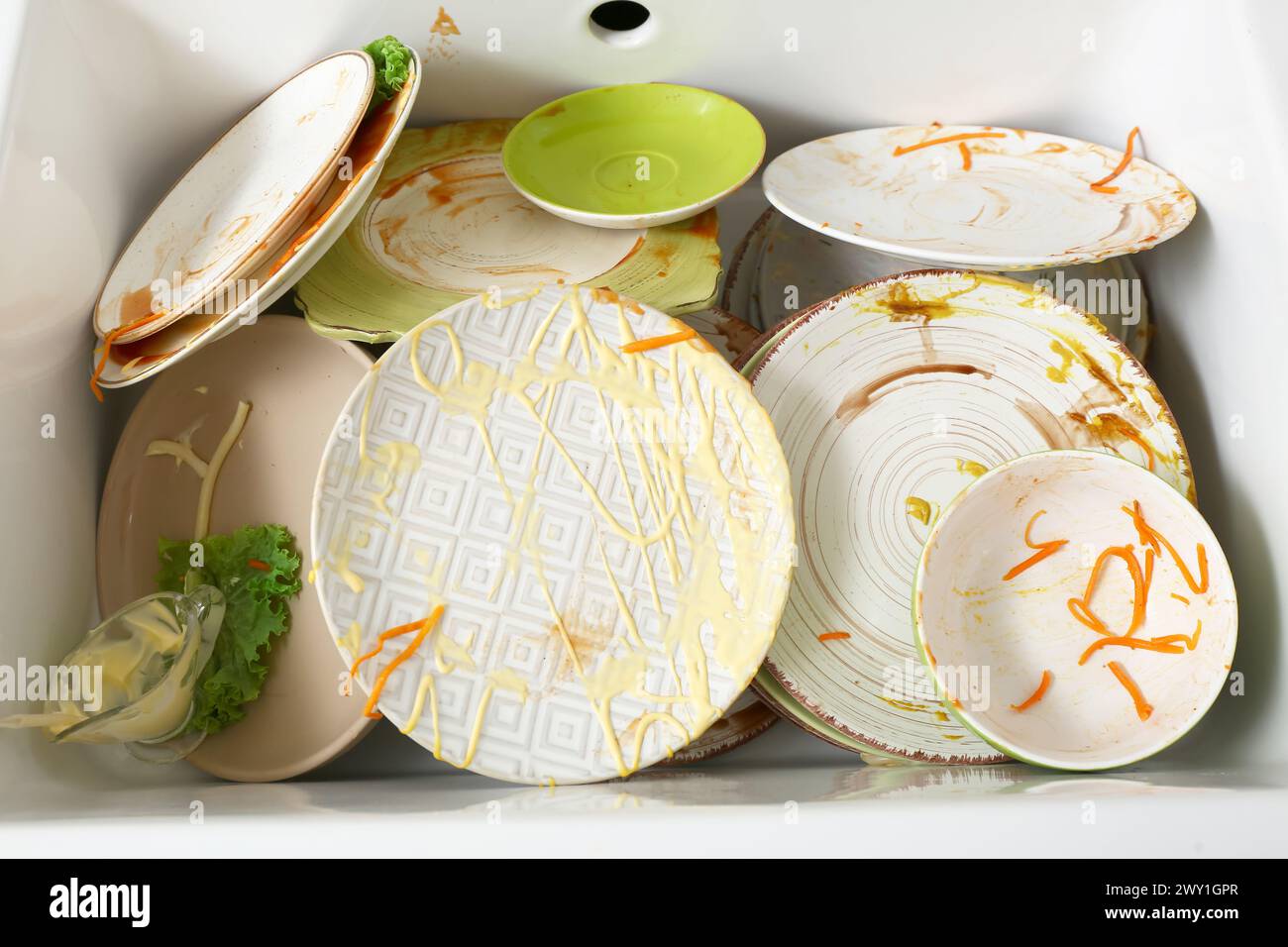 Dirty dishes in ceramic sink Stock Photo - Alamy