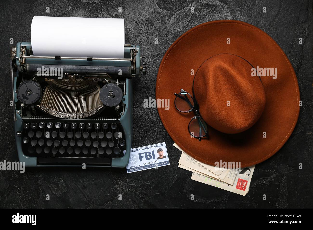 Retro typewriter, document of FBI agent, stylish hat and eyeglasses on ...