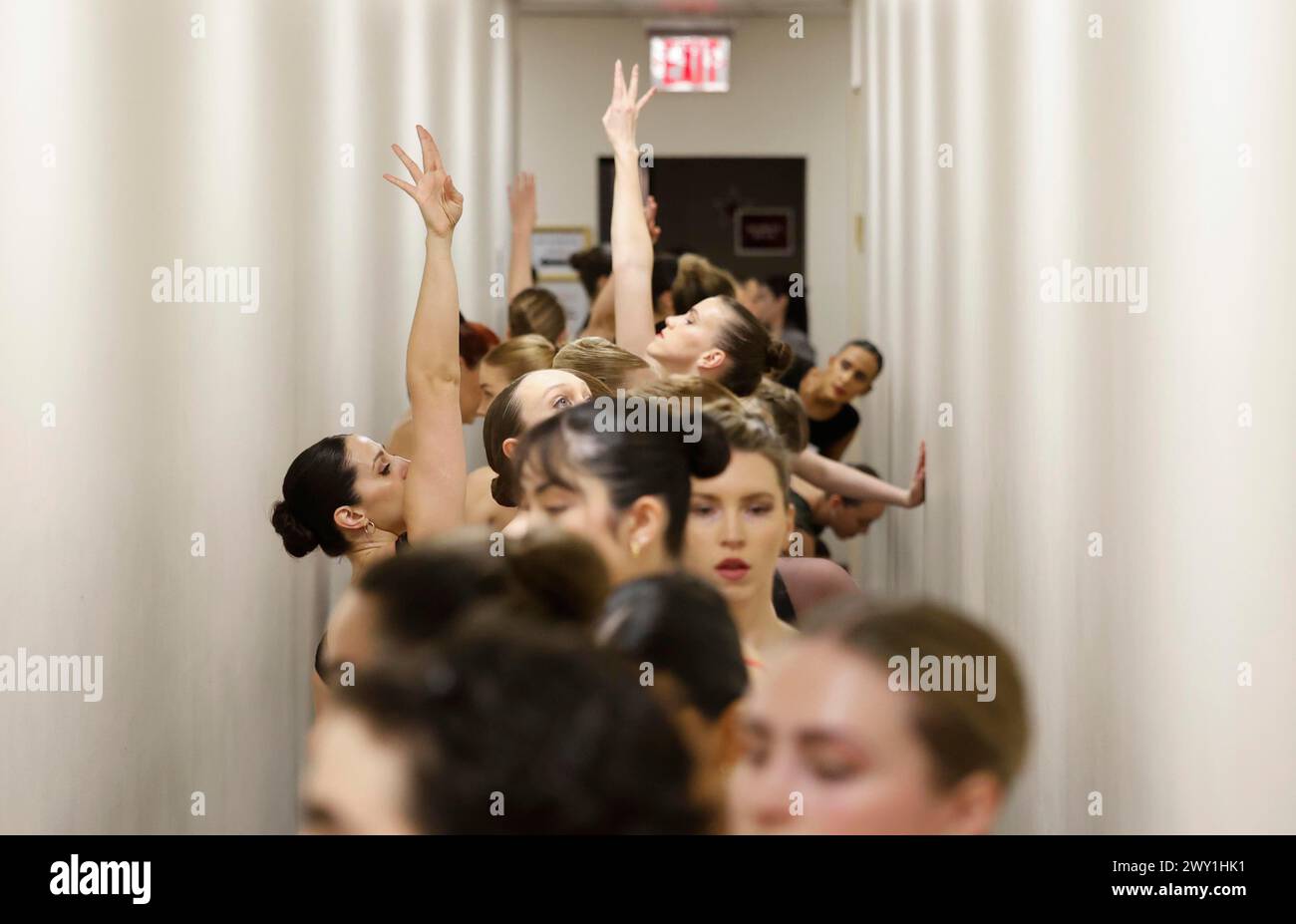 New York, United States. 03rd Apr, 2024. Dancers warm up when they ...