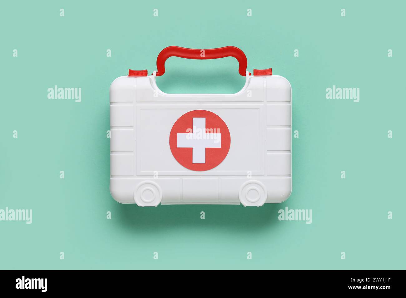 Toy first aid kit on turquoise background.Top view Stock Photo - Alamy