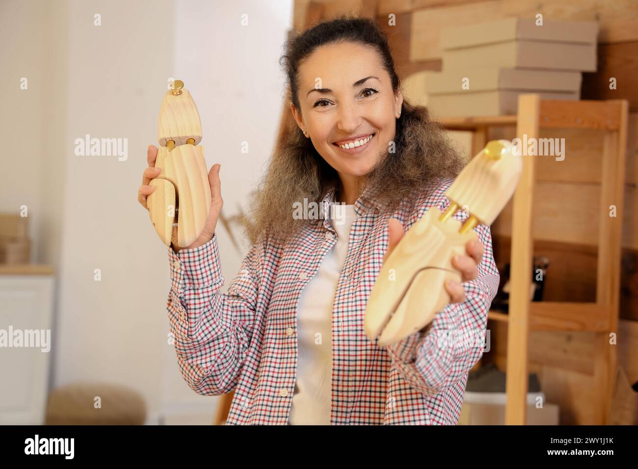 Female shoemaker wooden shoe hi-res stock photography and images - Alamy