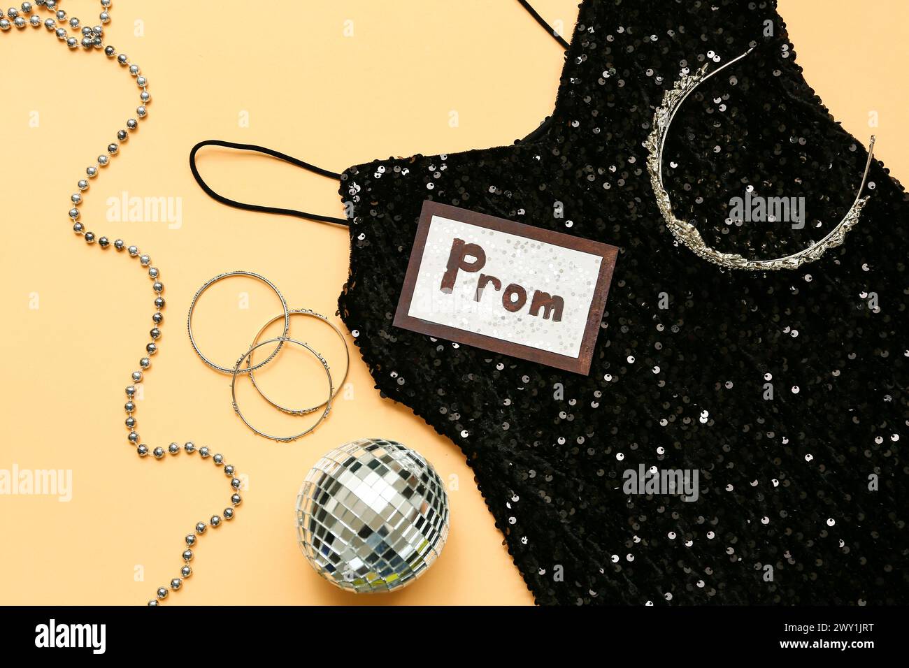 Word PROM with dress, disco ball and accessories on beige background ...