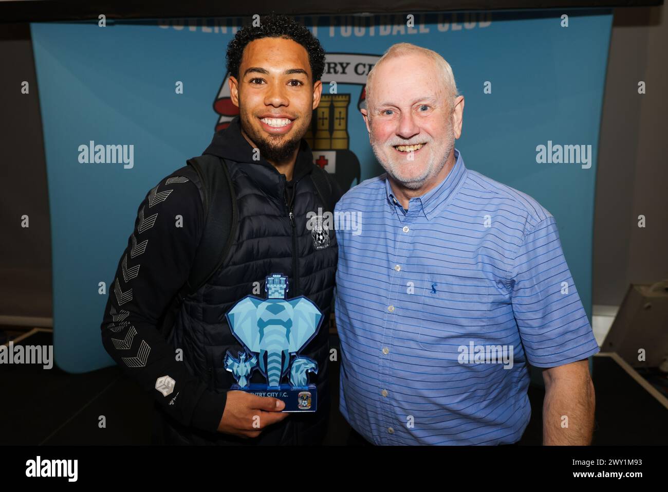 Coventry City's Milan van Ewijk poses for a photo after receiving the ...