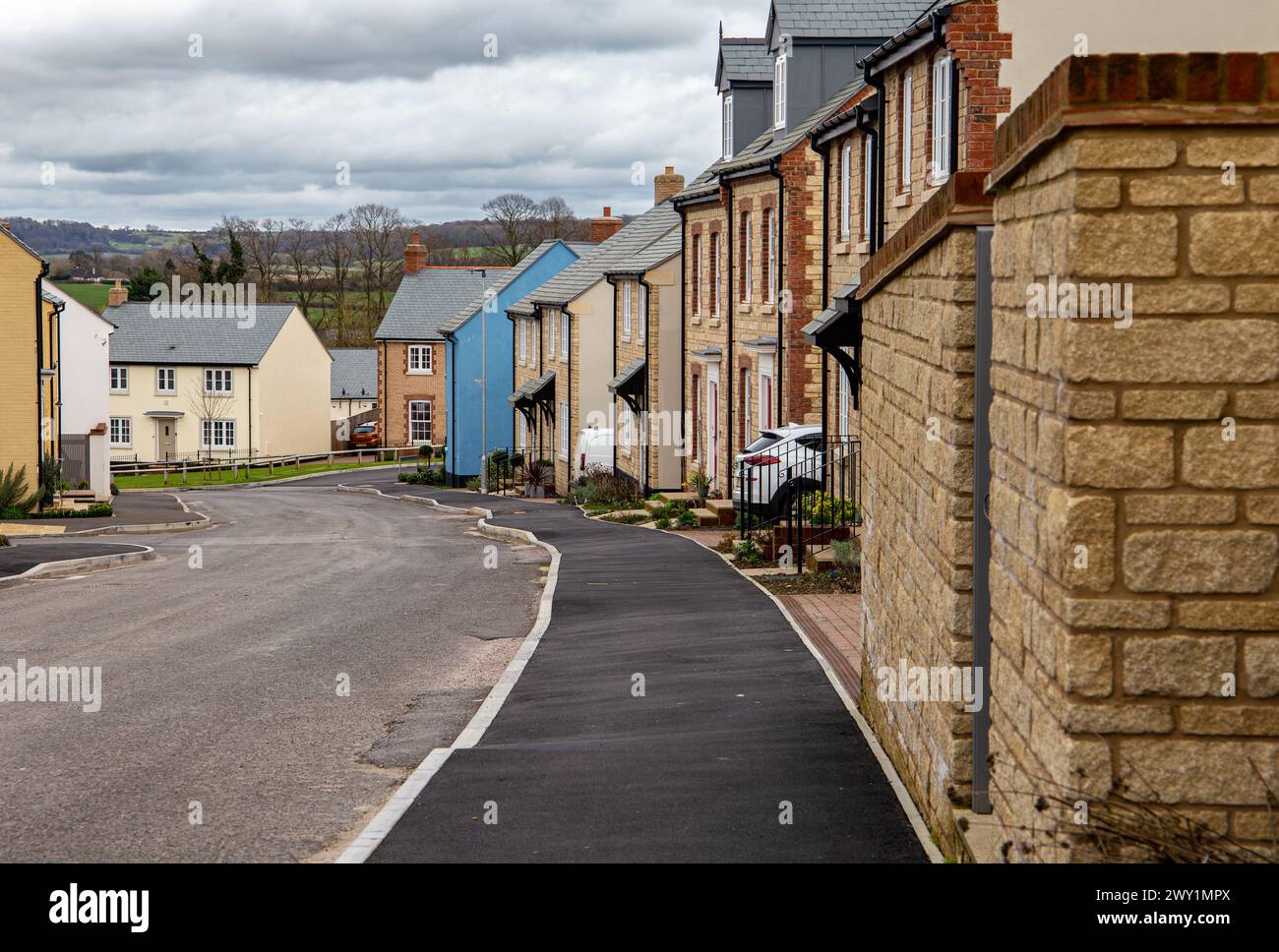 Recently completed new build housing site with tarmacked pavement ...