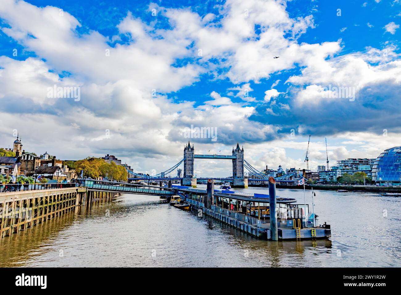 Tower Bridge is a drawbridge in London. It crosses the River Thames ...