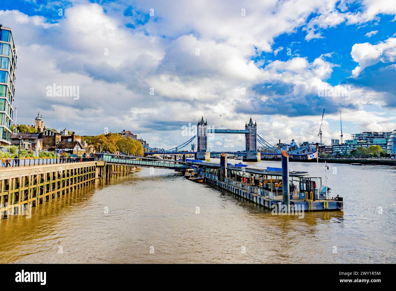 Tower Bridge is a drawbridge in London. It crosses the River Thames ...
