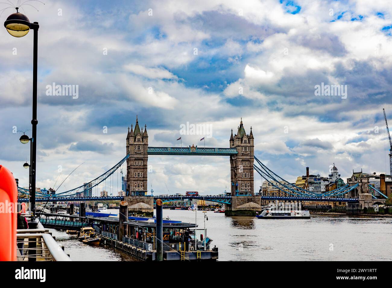 Tower Bridge is a drawbridge in London. It crosses the River Thames ...