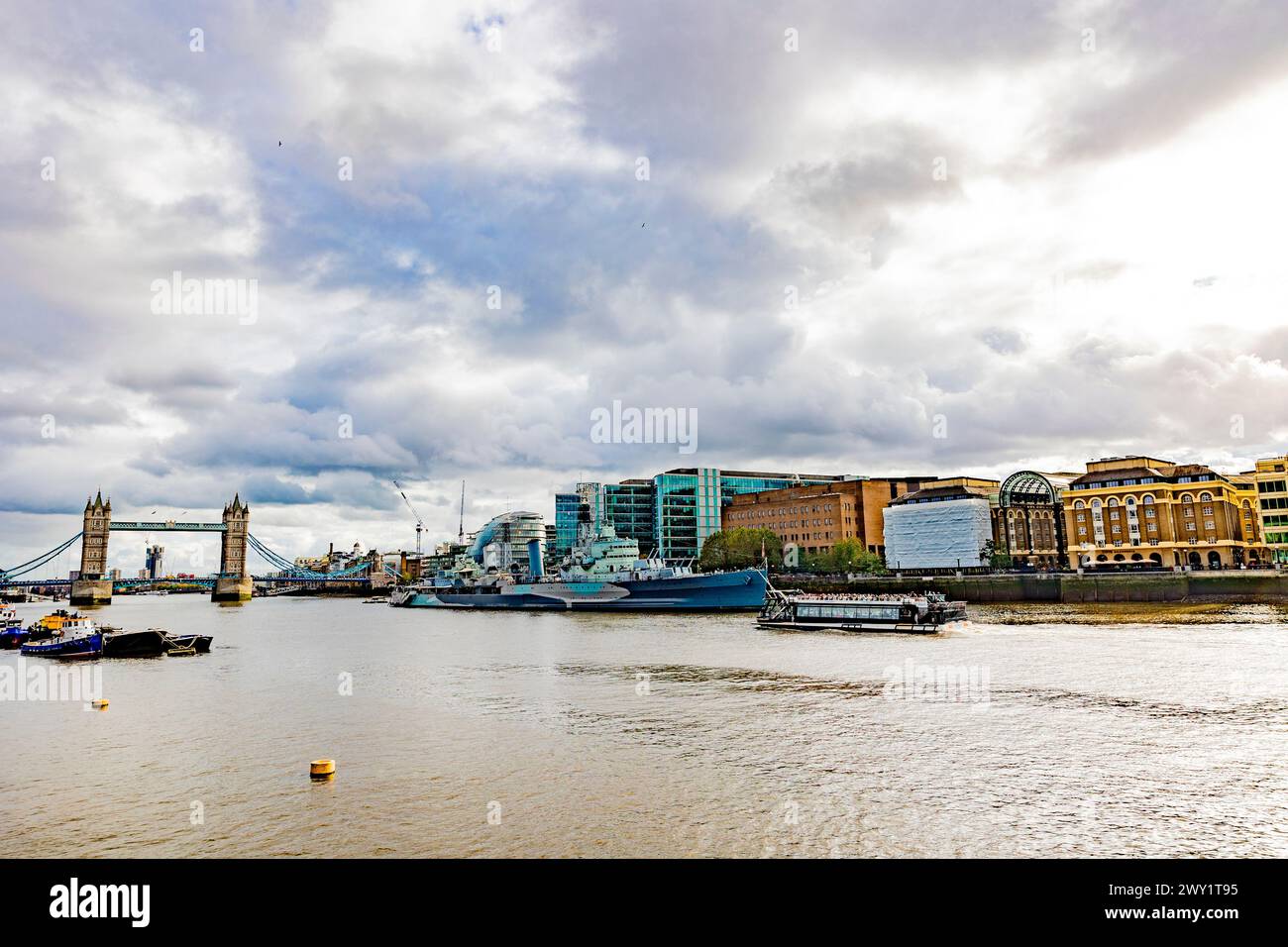 Tower Bridge is a drawbridge in London. It crosses the River Thames ...