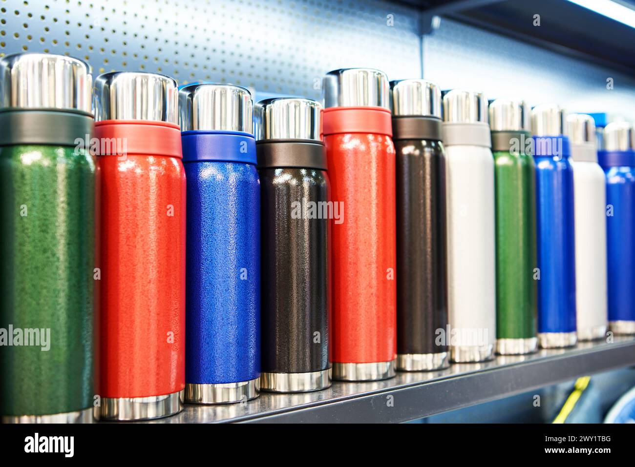 Colored thermos in the shop window Stock Photo - Alamy