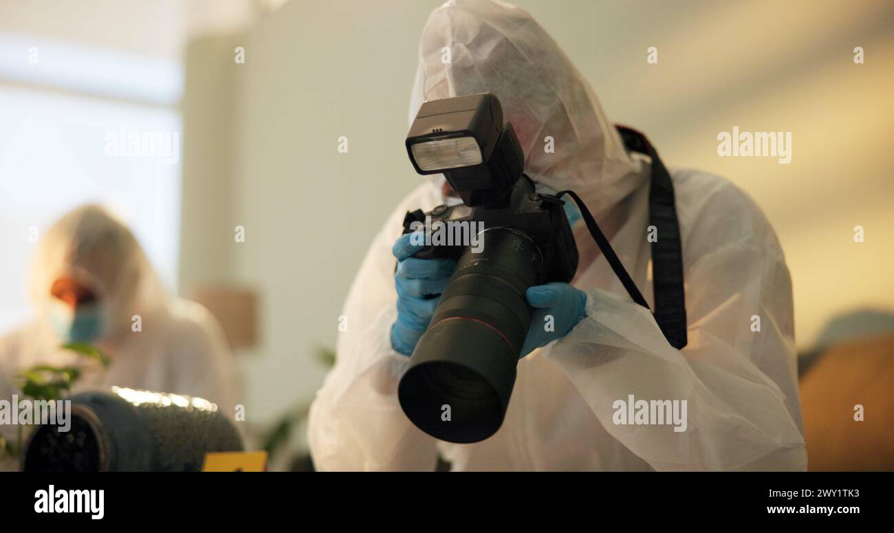 Camera, forensics and investigation of evidence at crime scene for case ...