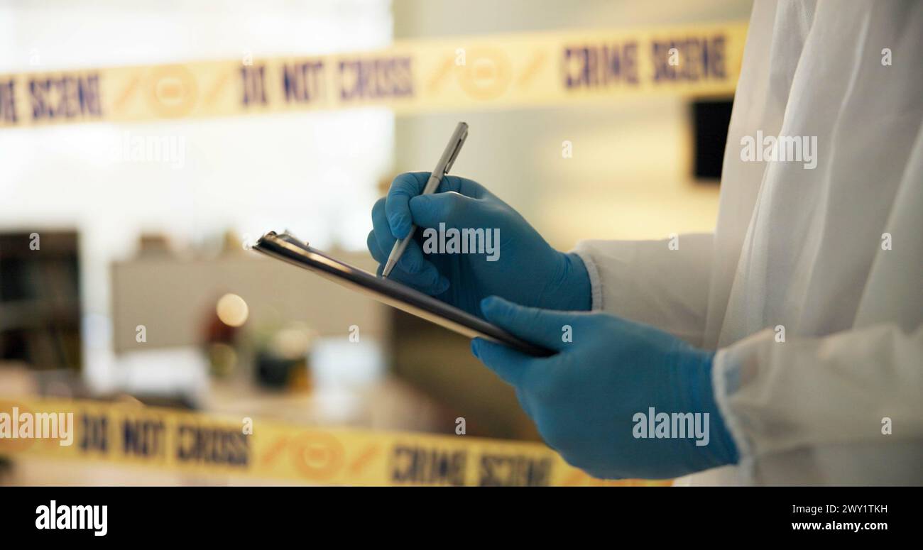 Crime scene tape hand hi-res stock photography and images - Alamy