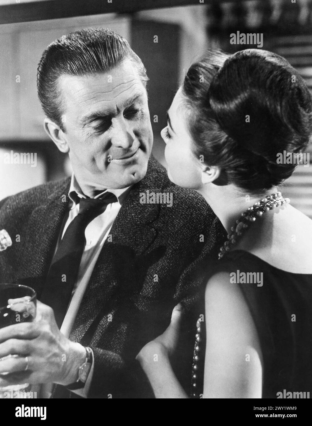 Kirk Douglas, Barbara Rush, on-set of the film, "Strangers When We Meet ...