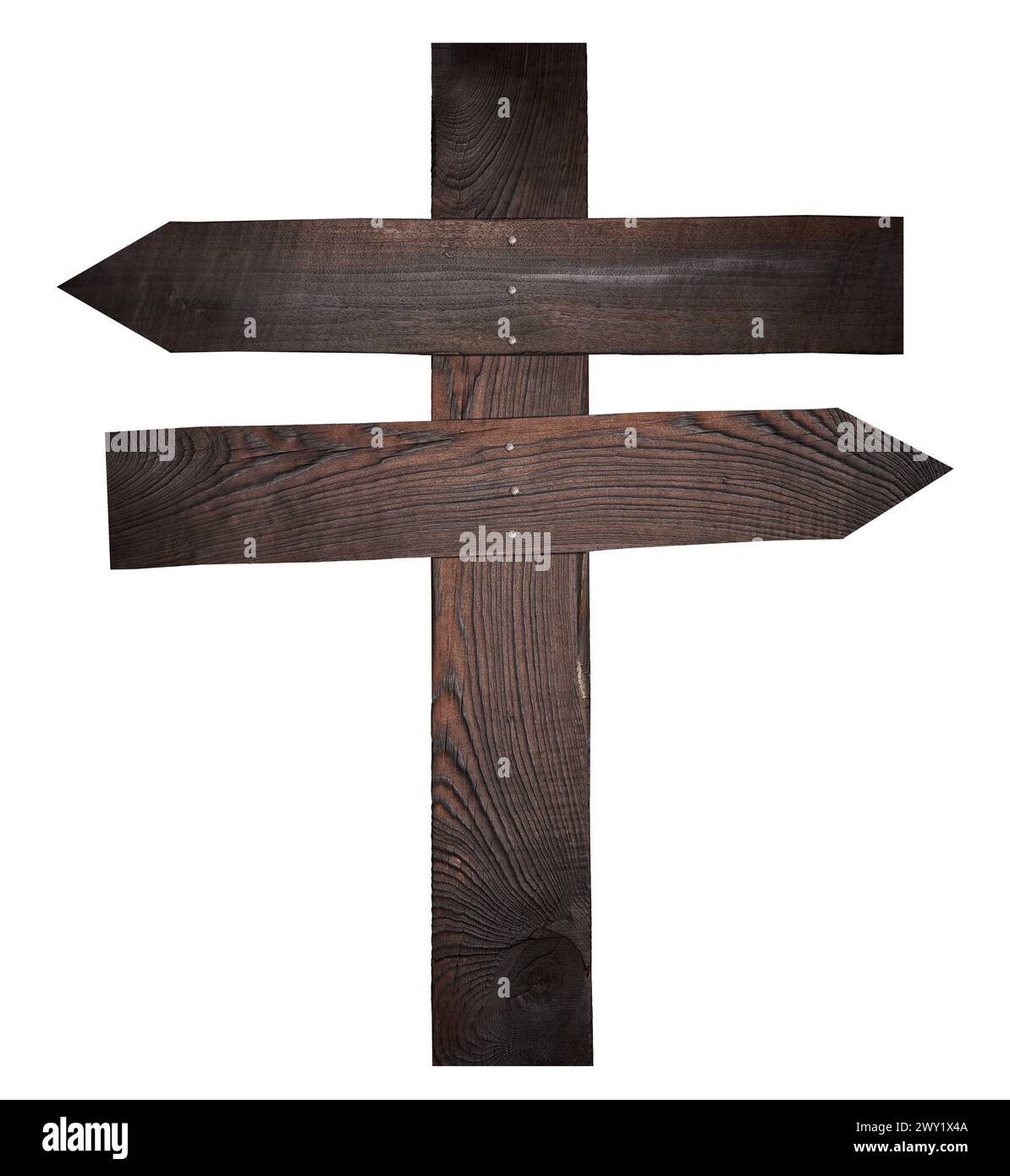 Wooden boards nailed together in the form of arrows on a pole, a ...