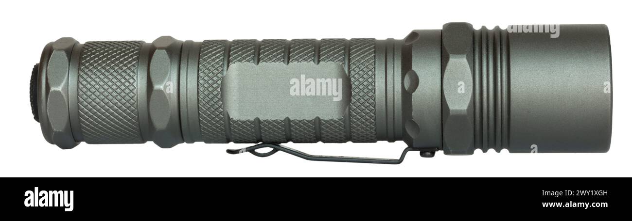 Side view of a tactical flashlight that is made from metal and is dust ...