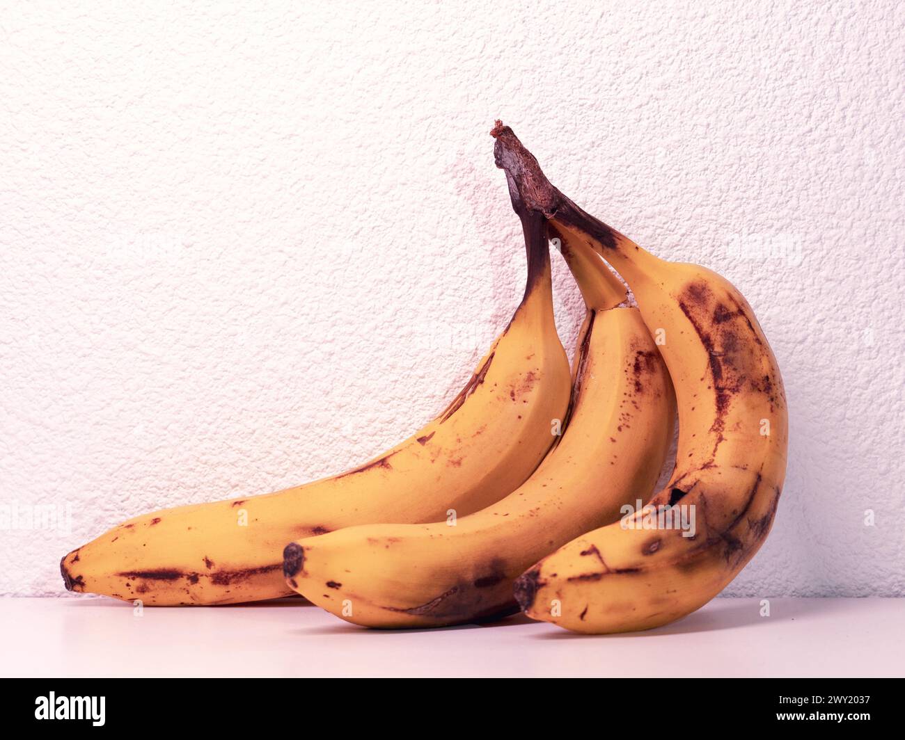 bananas whether spoiled on white background, food waste, ecology ...