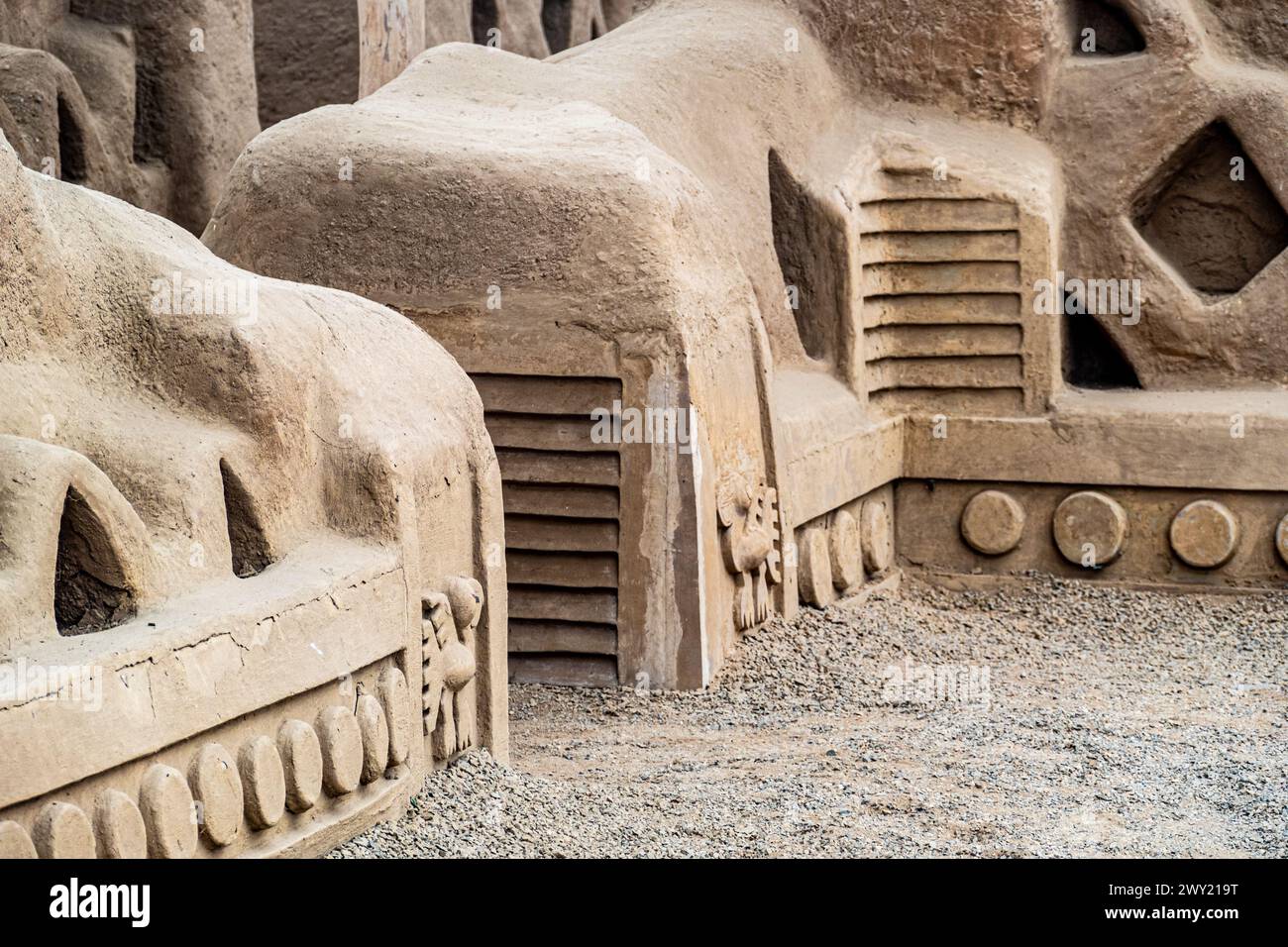Panorama of the adobe walls and decorations in the archaeological site ...