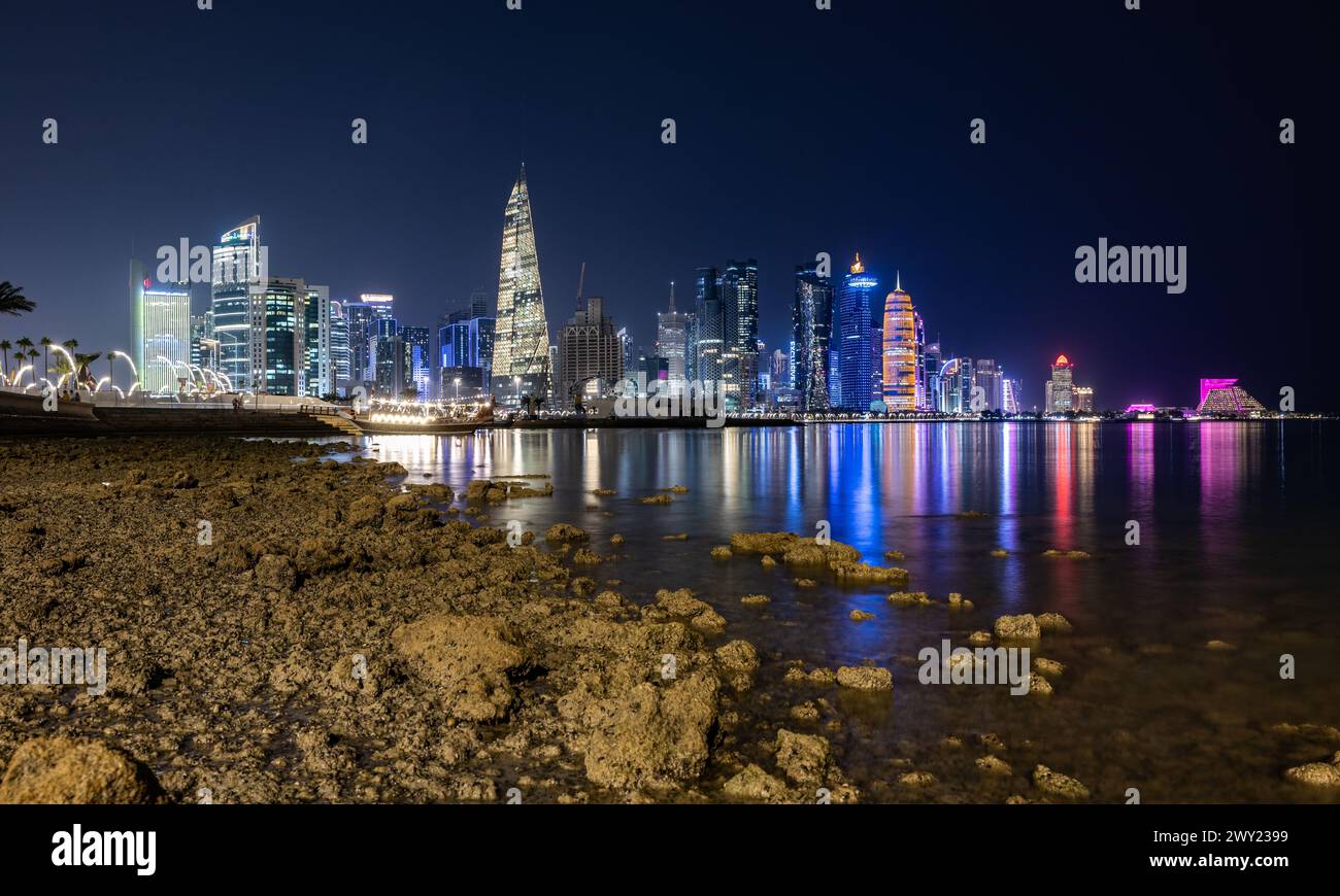 Doha night city skyline illuminated at night. Qatar, Middle East ...
