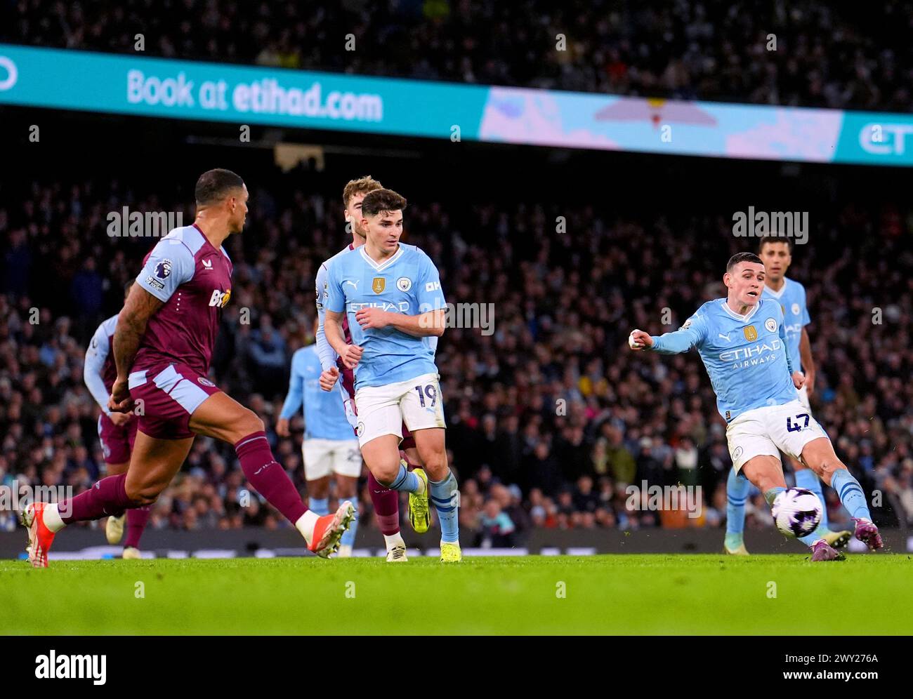 Manchester City's Phil Foden scores their side's fourth goal of the ...