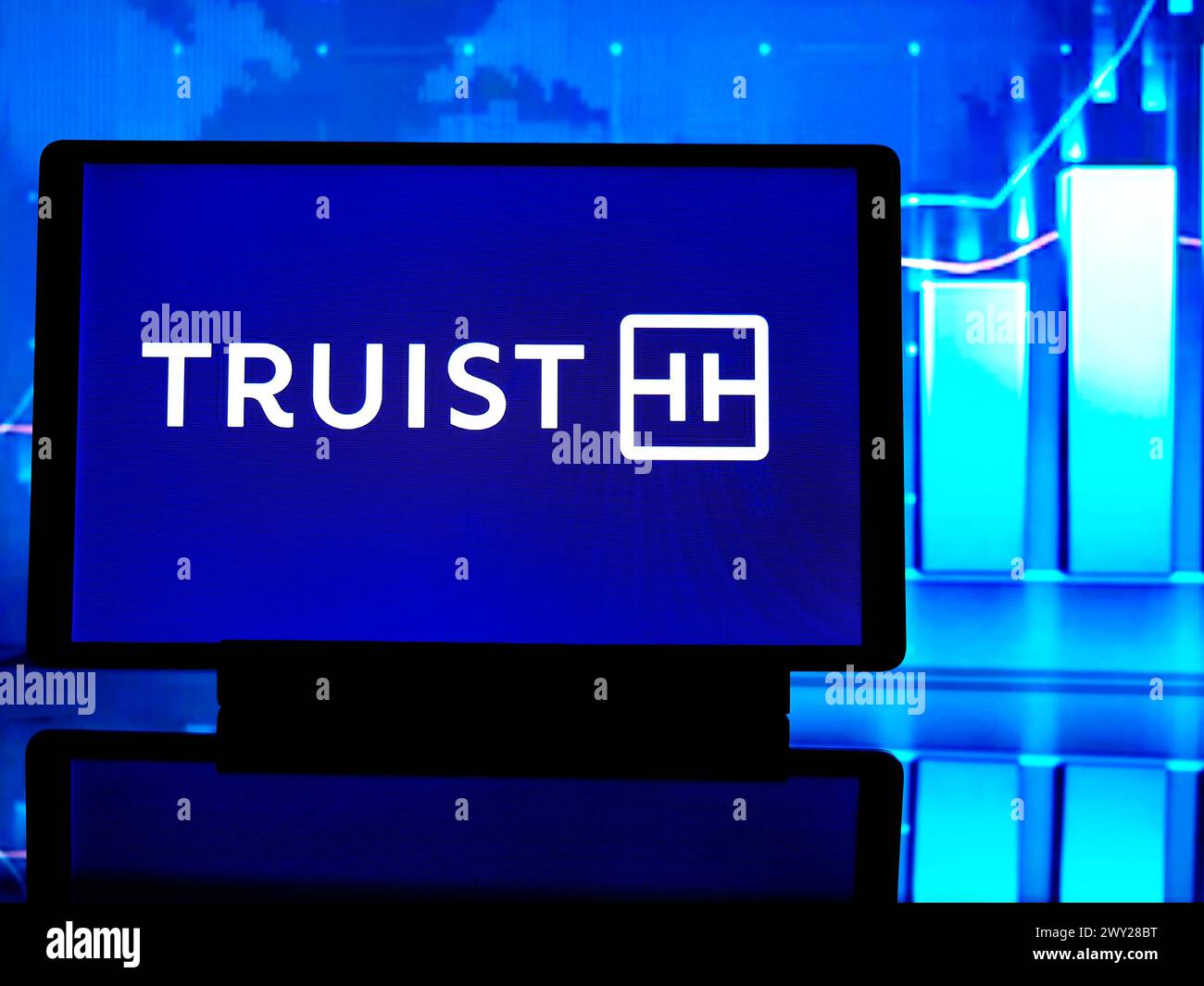 In this photo illustration, a Truist Financial Corporation logo seen ...