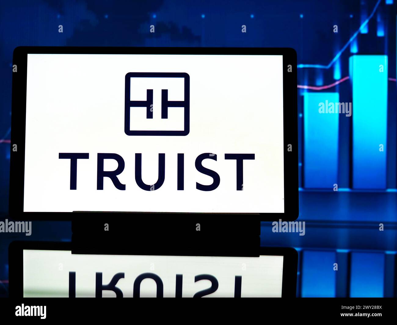 In this photo illustration, a Truist Financial Corporation logo seen ...