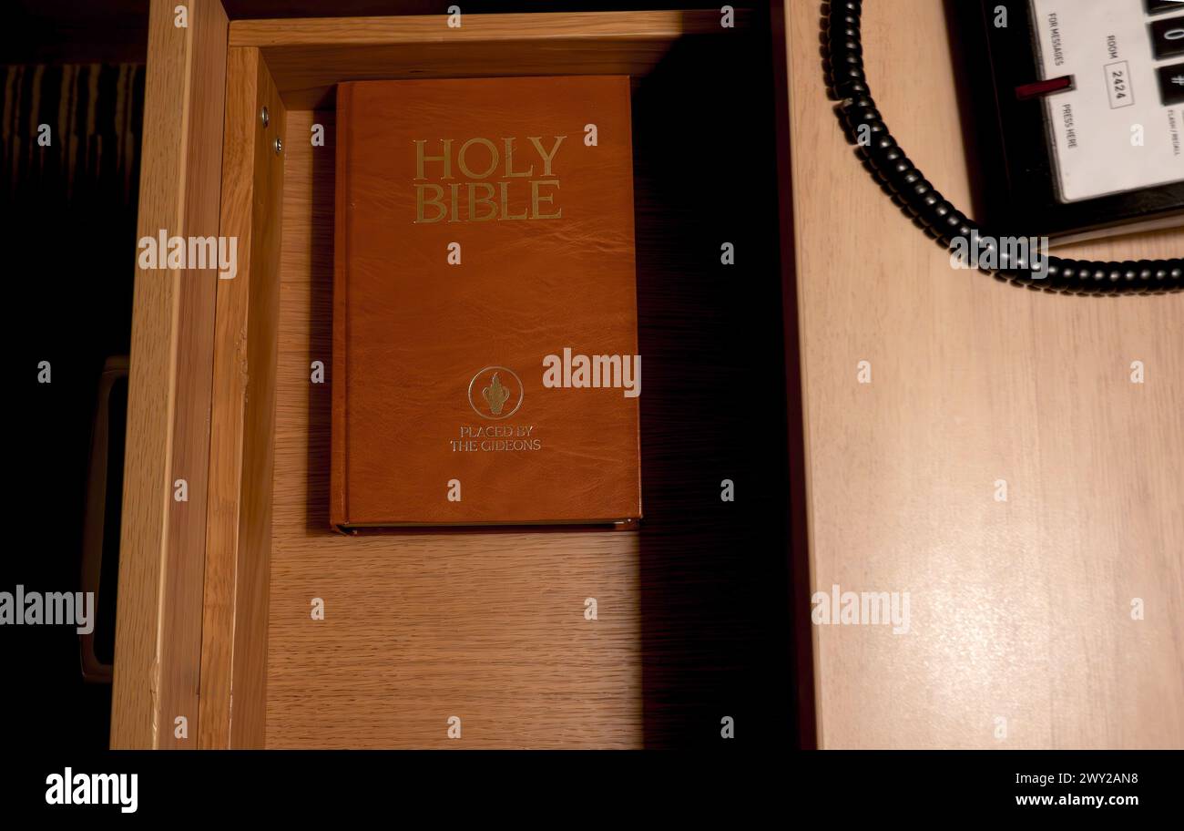 Holy Bible in Hotel Room drawer Stock Photo - Alamy