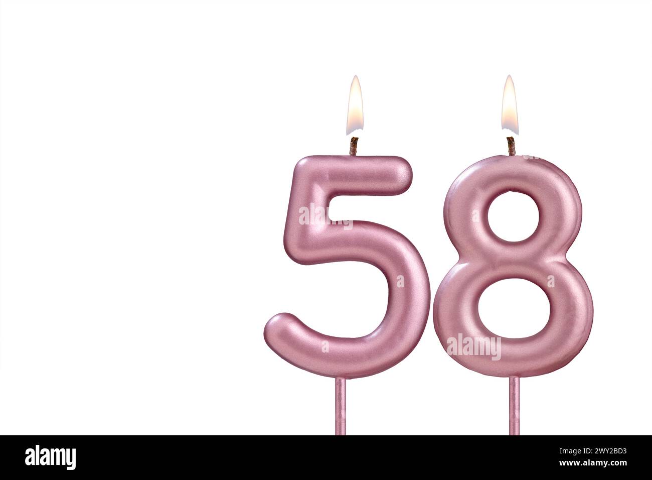 Lit birthday candle - Candle number 58 on white background Stock Photo ...