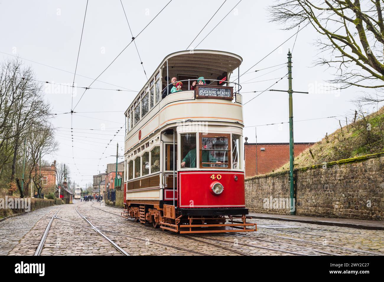 Tram travelling over the cobblestones seen at the National Tramway ...