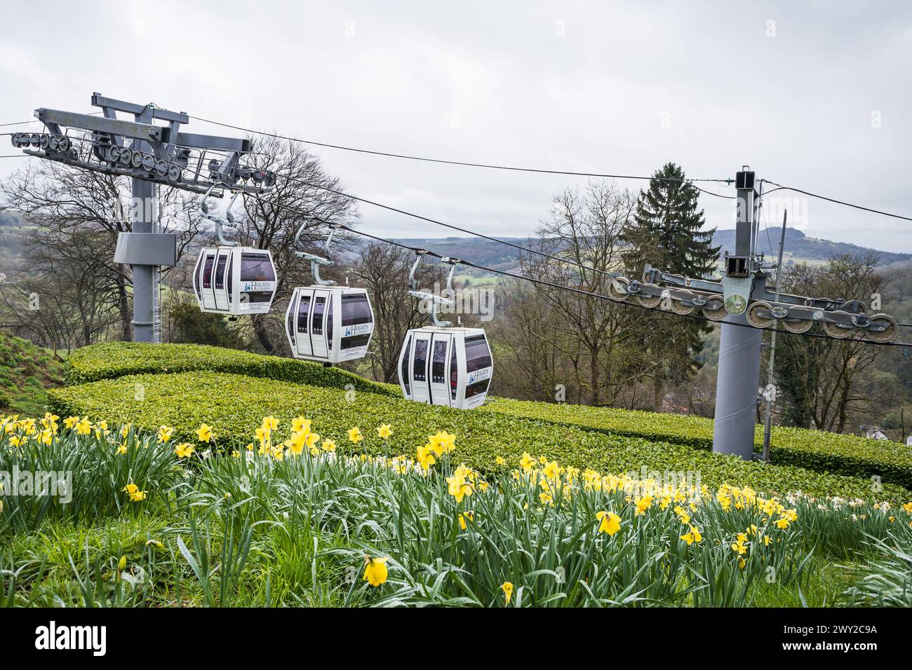 Cable cars descend into the peak of the Heights of Abraham seen over ...