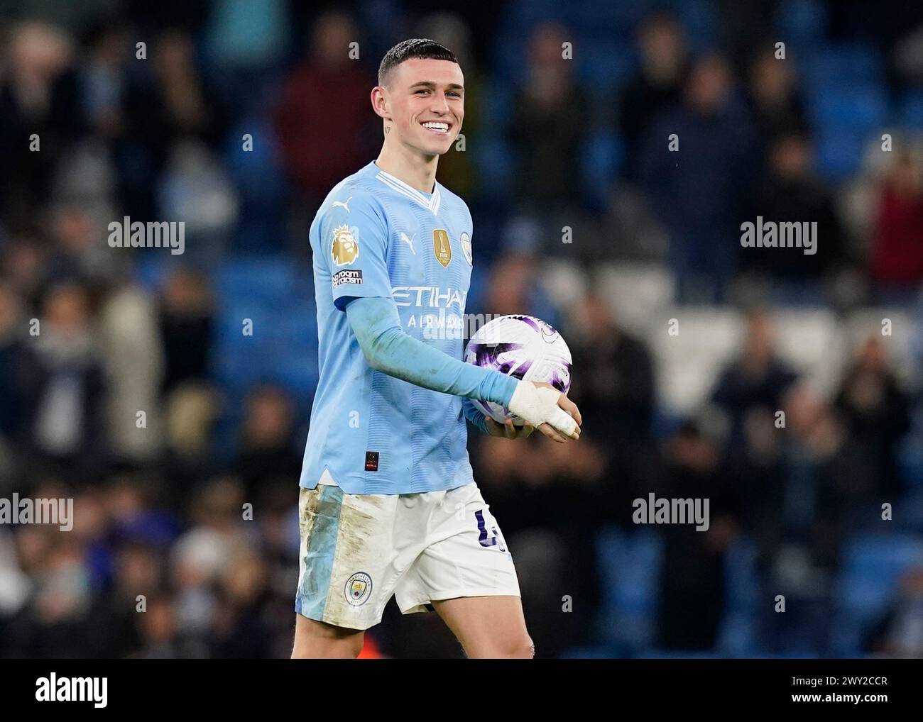 Manchester, UK. 3rd Apr, 2024. Phil Foden of Manchester City takes the ...