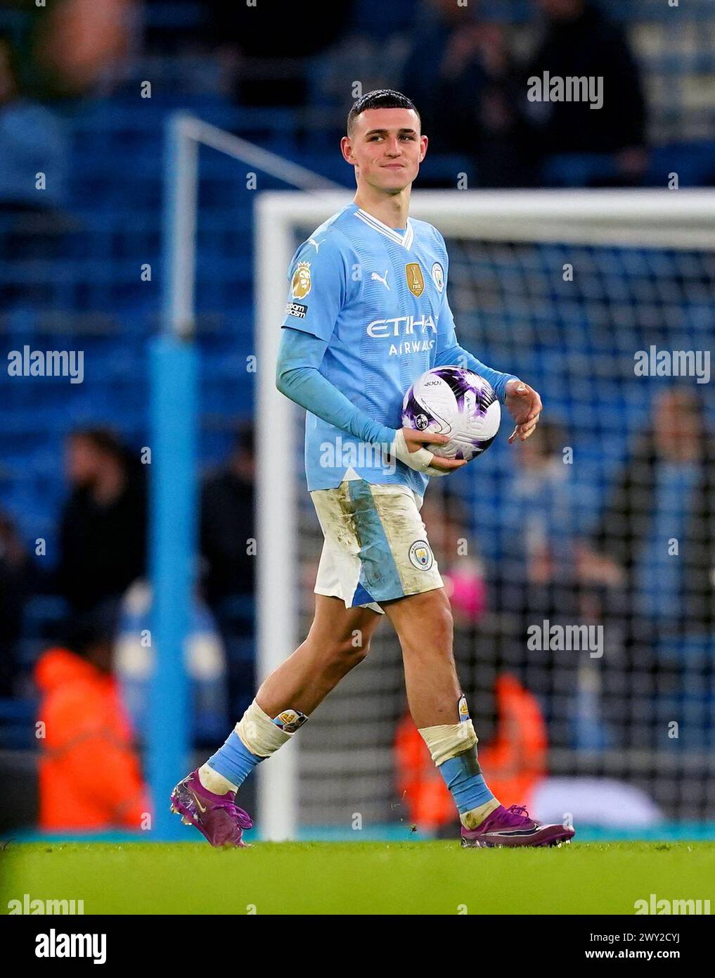 Manchester City's Phil Foden with the match ball at the end of the ...