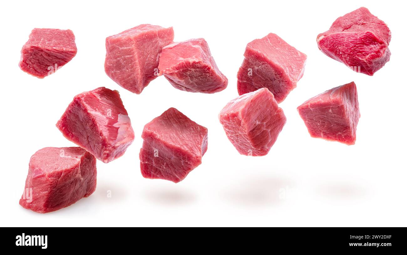 Diced beef cuts levitating in air on white background. File contains ...
