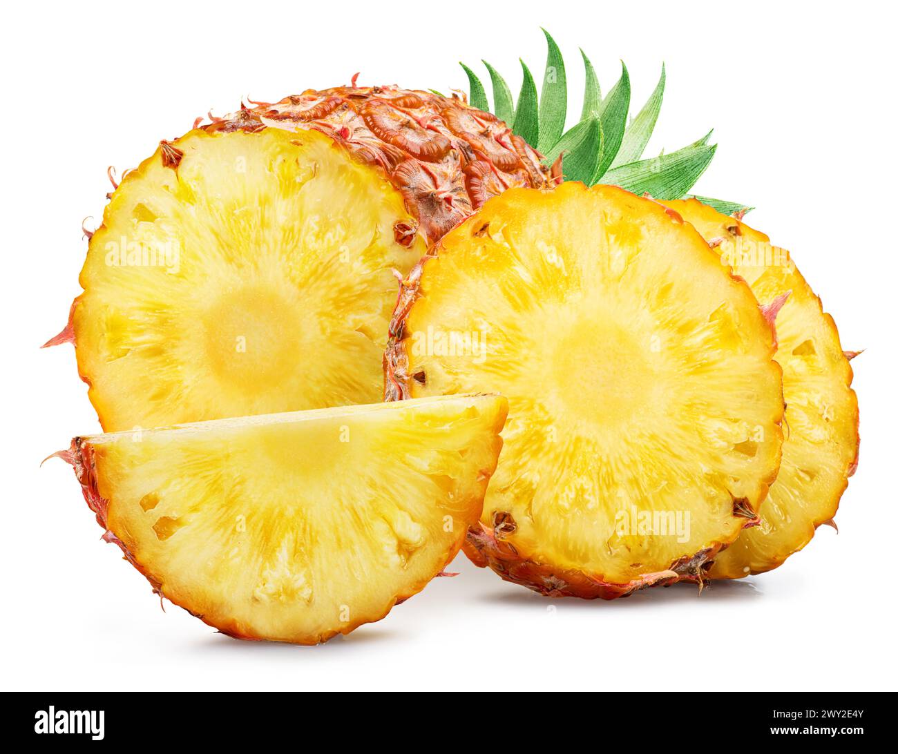 Ripe pineapple and pineapple slices isolated on white background. File ...