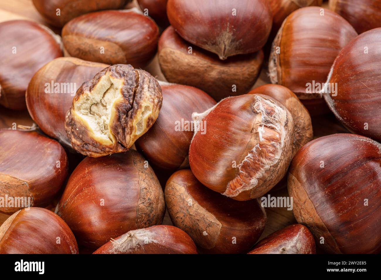 Edible sweet chestnuts with roasted chestnut. Great food background for ...