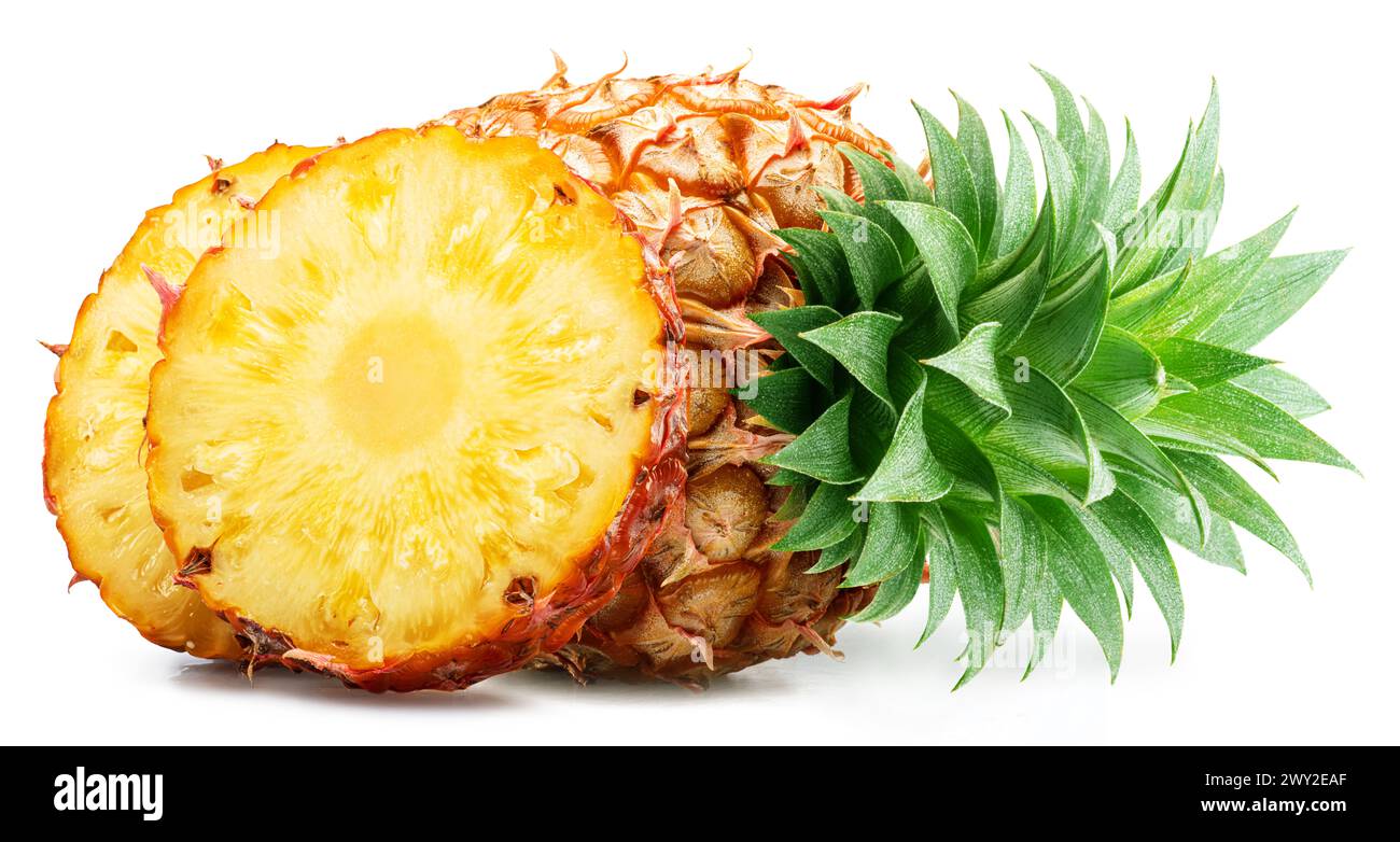 Ripe pineapple and pineapple slices isolated on white background. File ...