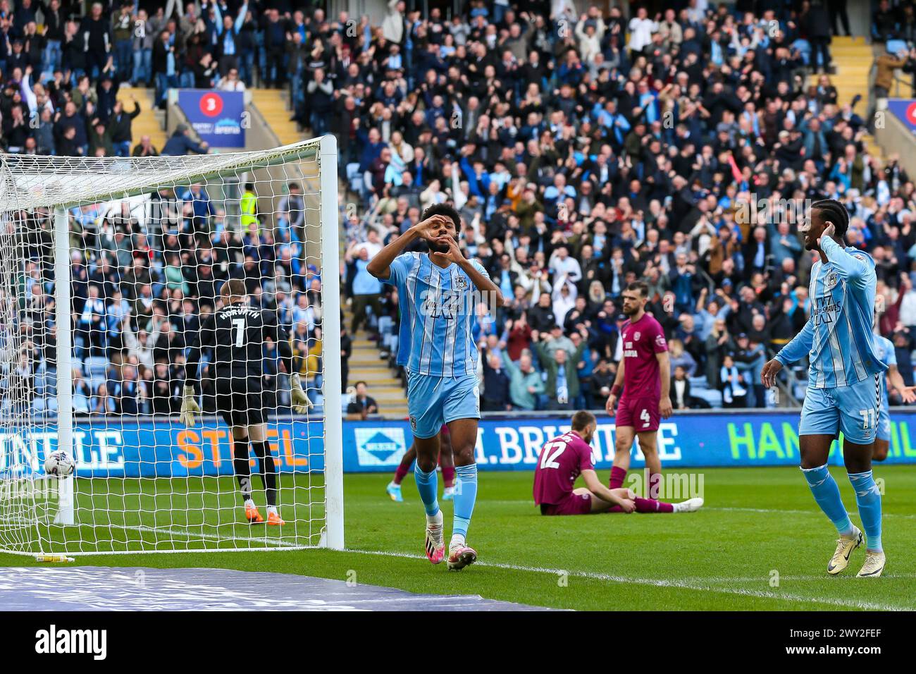 Coventry City's Ellis Simms celebrates scoring their side's first goal ...