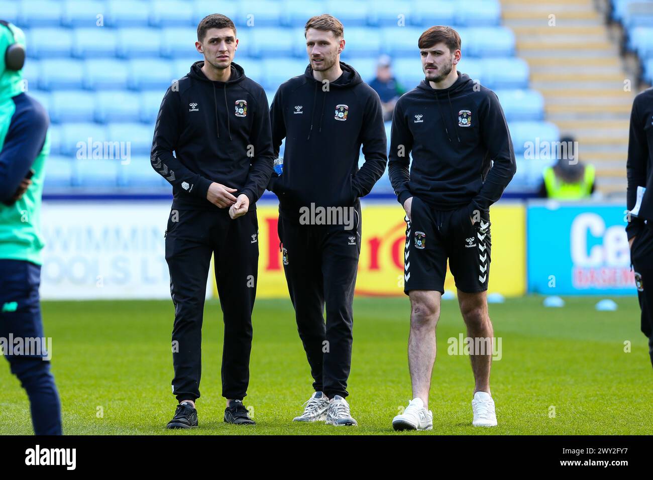 Coventry City's Bobby Thomas, goalkeeper Bradley Collins and Liam ...